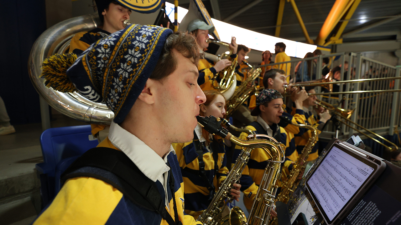 University pep band brings games to life at the M&T Bank Arena ...